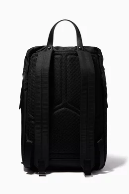 black backpack with triangle logo